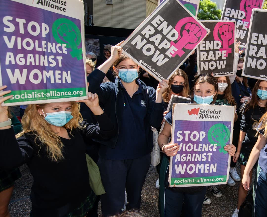 What caused the UK race riots?